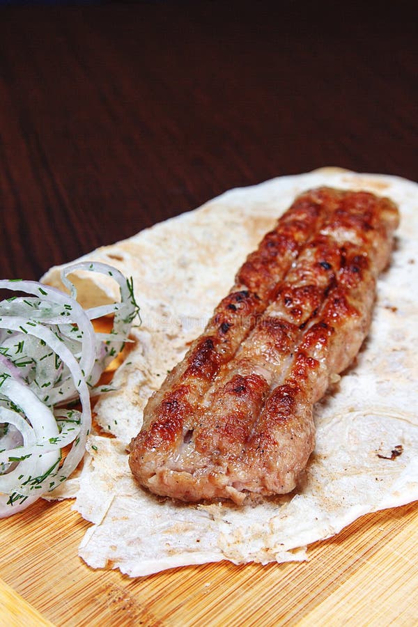 Kebab of minced meat stock photo. Image of cevapcici - 93054692
