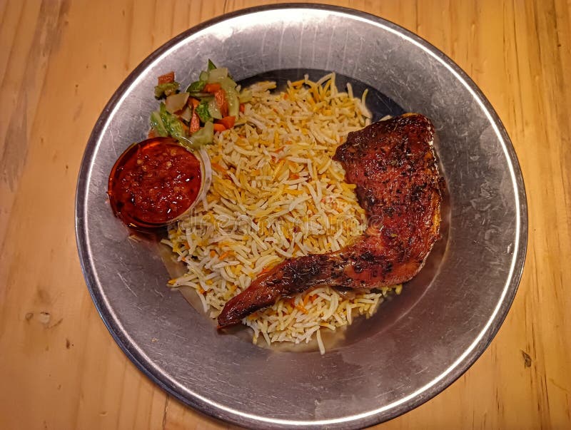 Kebuli Rice with Grilled Chicken Thighs Stock Image - Image of thighs ...