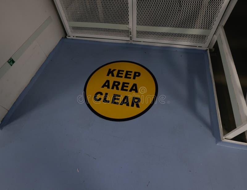 Keep Area Clear Sign in Red with White Letters Stock Photo - Image of ...