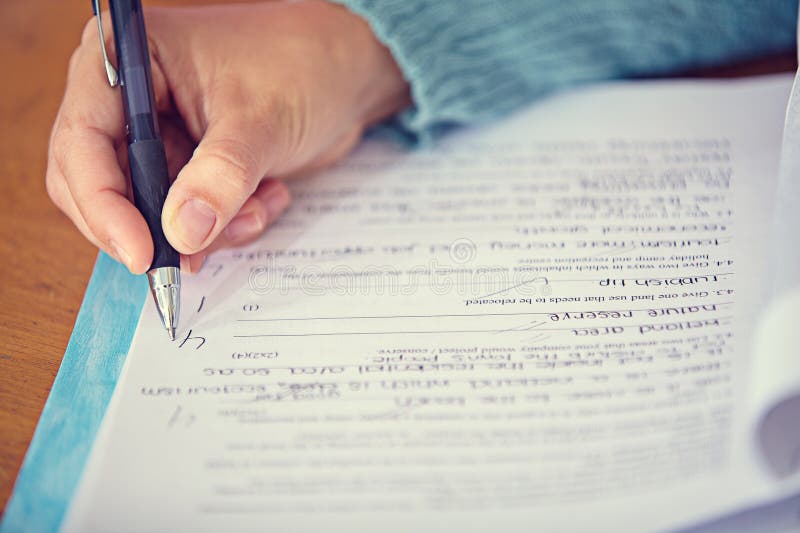 Keep Calm and Mark on. Closeup Shot of a Teacher Marking a Test. Stock ...
