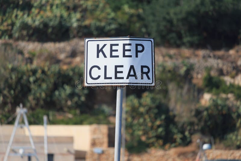 Keep Clear Road Sign in Blue Sky Background, Vertical. Stock Image ...