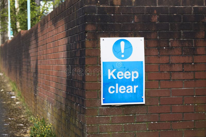 Keep Clear Sign on Wall of Private Property Stock Photo - Image of road ...
