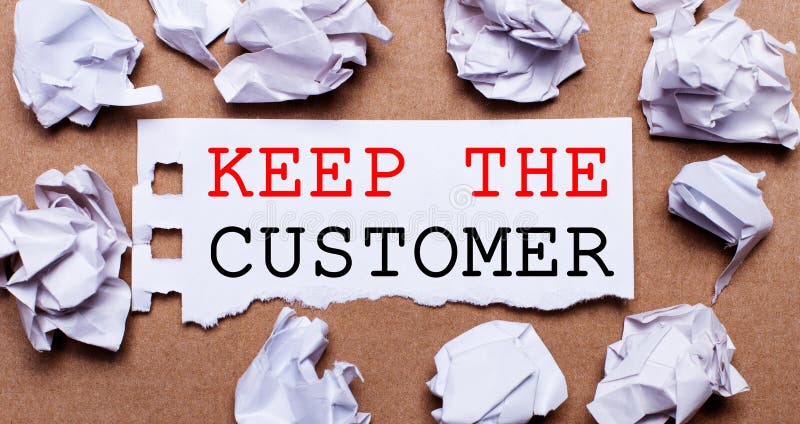 KEEP the CUSTOMER Written on White Paper on a Light Brown Background ...
