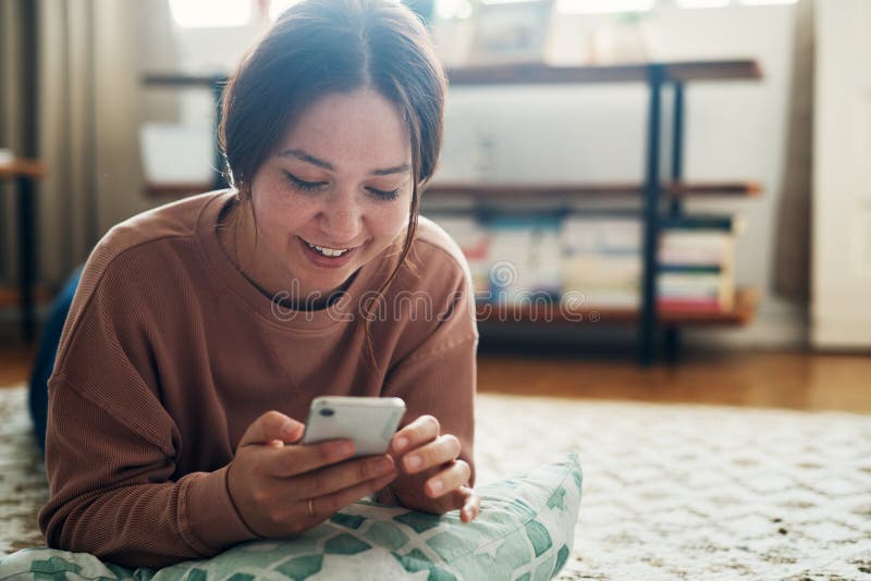Keep the Distance, Keep the Connection. a Young Woman Using a ...
