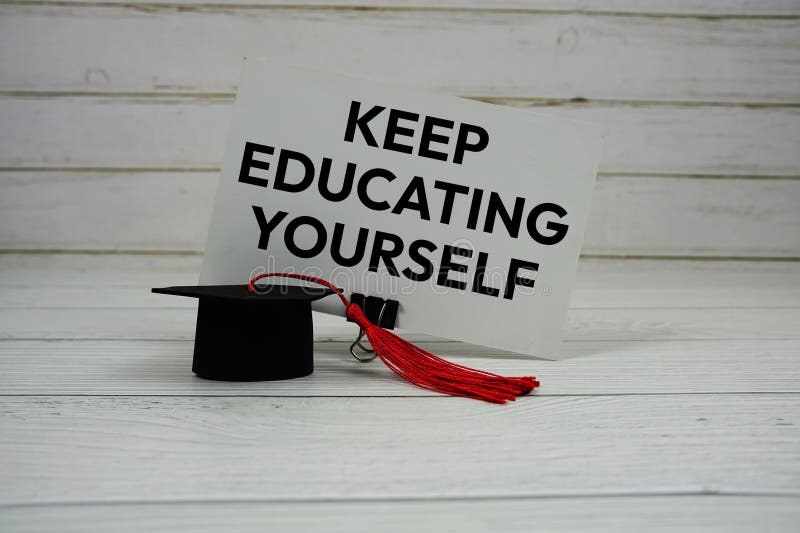 Keep Educating Yourself Text on Paper Card with Small Graduation Cap on ...