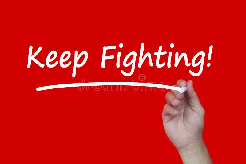 Keep Fighting Text on Blackboard with Hand Holding Chalk. Stock Image ...
