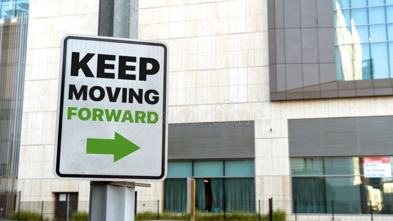 Keep Moving Forward Sign in Downtown City Setting Stock Image - Image ...