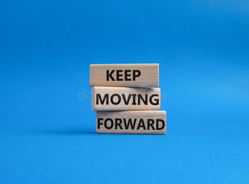 Keep Moving Forward Symbol. Concept Words Keep Moving Forward on Wooden ...