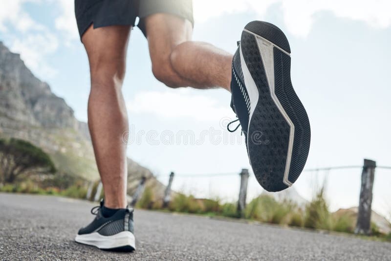 Keep it Moving. a Man Running on a Mountain Road. Stock Image - Image ...