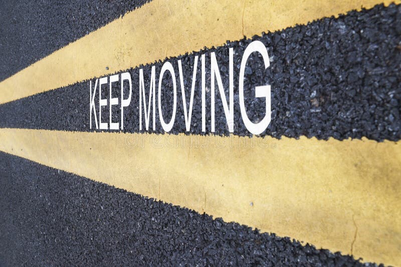 Keep Moving Word with Yellow Line Marking on Road Surface Stock Image ...