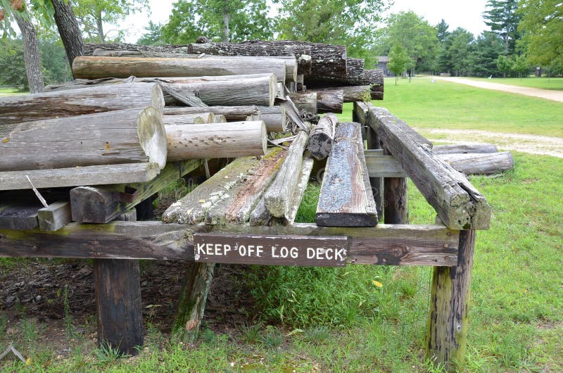 Keep Off Log Deck Sign with Wood Structure and Logs Stock Photo - Image ...