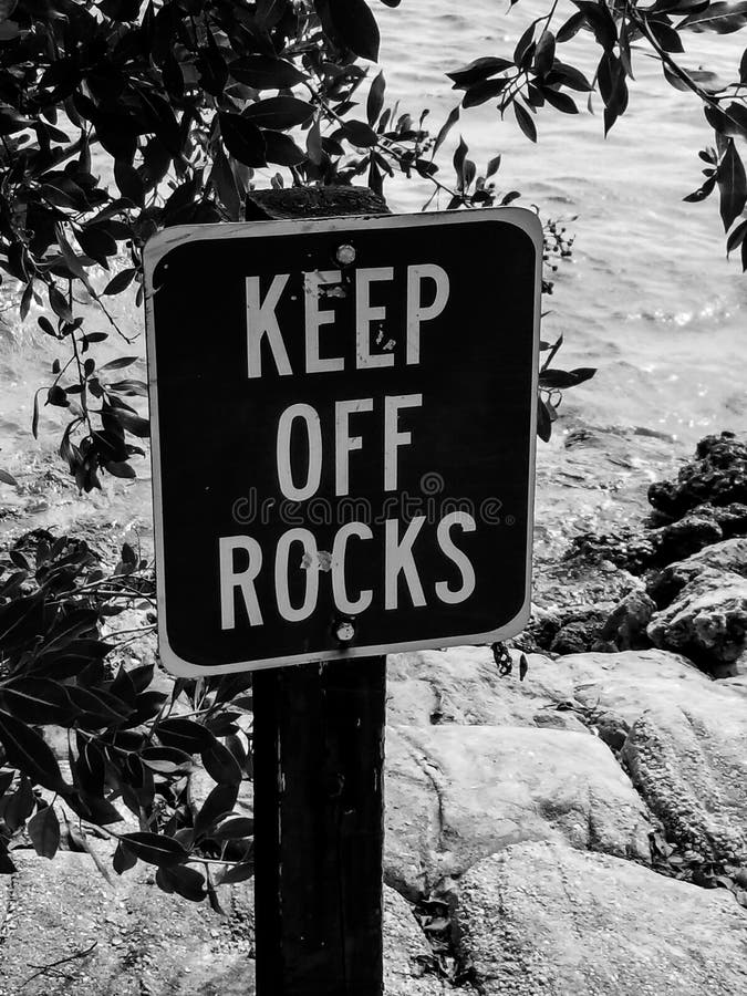 Keep Off the Rocks in Black and White Stock Photo - Image of rocks ...