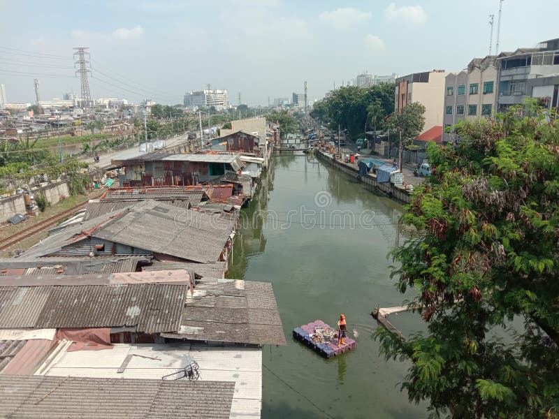 Cleaning the river stock photo. Image of river, city - 274250512