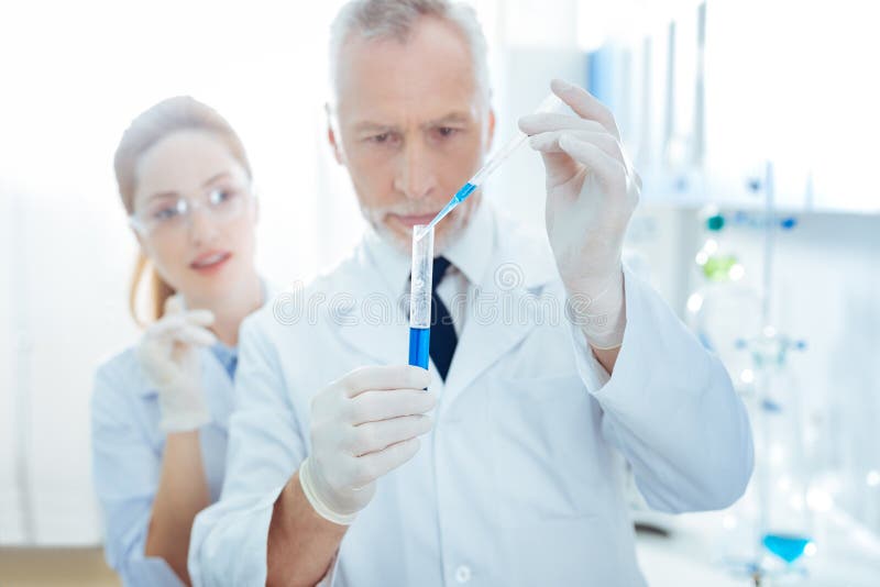 Competent Scientist Doing Difficult Experiment Stock Image - Image of ...
