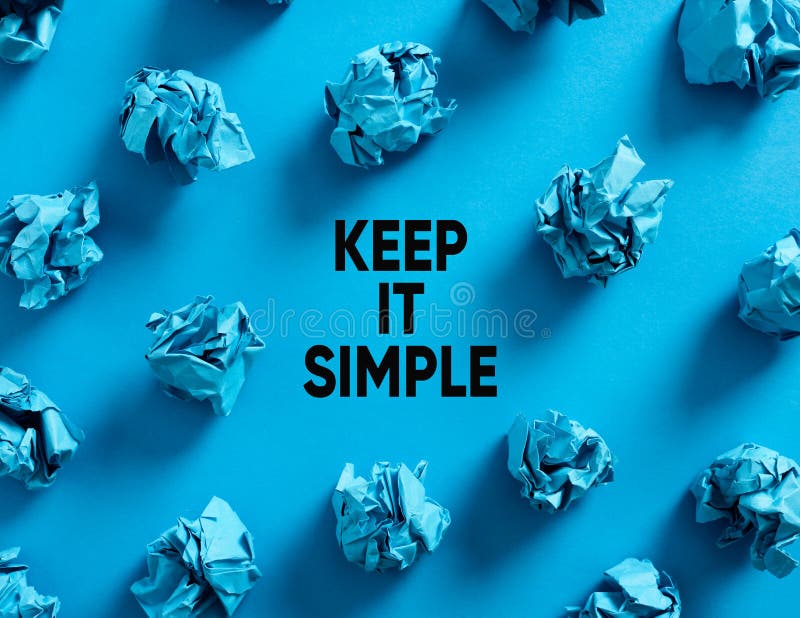 Keep it Simple Message with Crumpled Blue Paper Balls on Blue ...