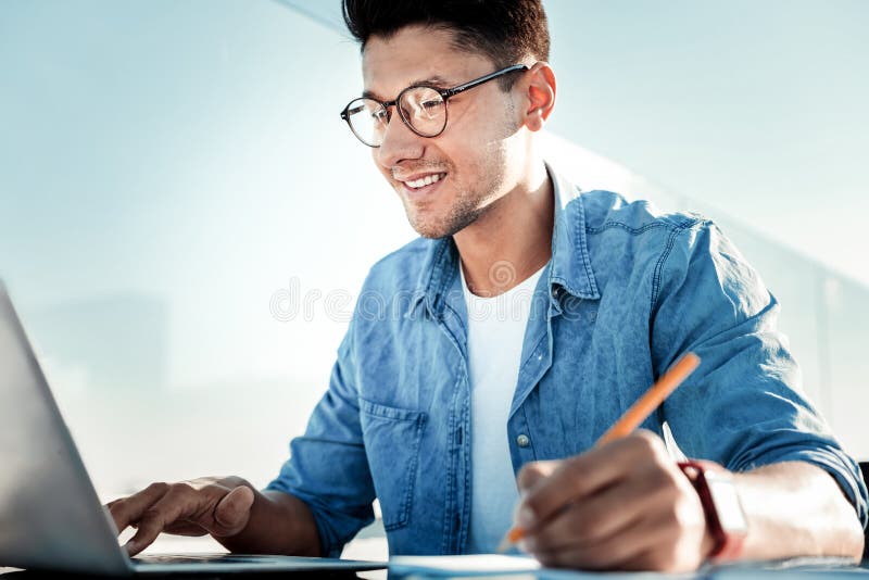 Attractive Brunette Man while Working at Project Stock Image - Image of ...