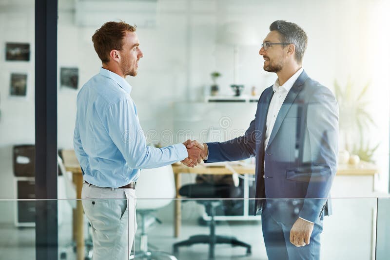 Keep Up the Exceptional Work. Two Businessmen Shaking Hands in an ...