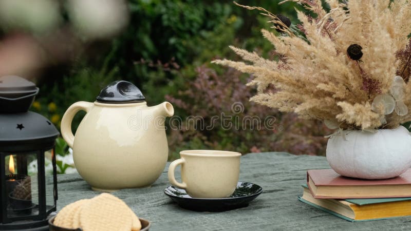 Keep Warm, Autumn Tea Party. Mug and Teapot on Table Outdoors. Stock ...