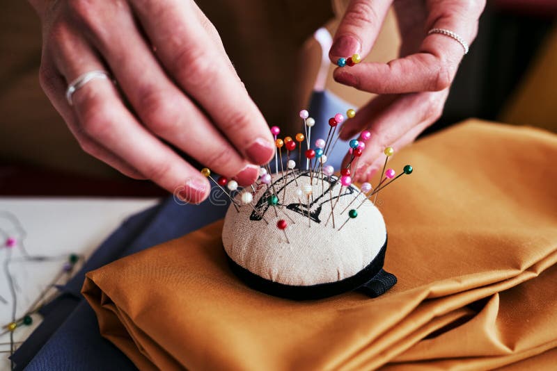 Keep Your Pins Organized. an Unrecognizable Designer Using a Pincushion ...