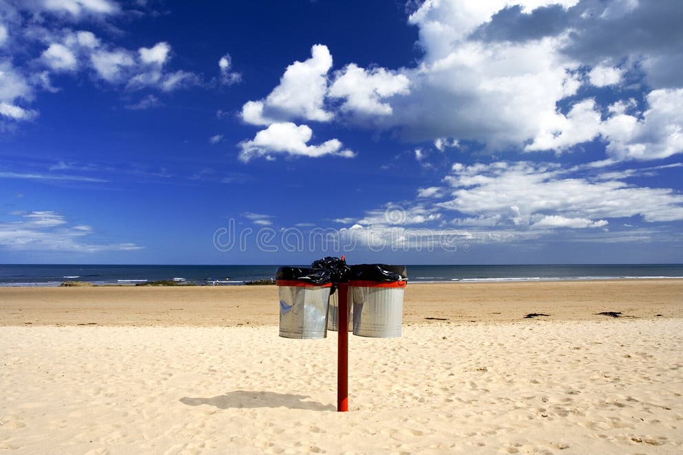 Keeping the Beach Clean stock image. Image of tidy, garbage - 2996963