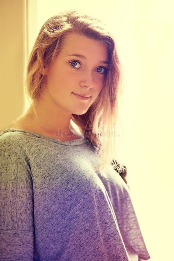 Keeping it Casual. Portrait of a Beautiful Young Girl in a Grey ... Keeping it Casual. Portrait of a Beautiful Young Girl in a Grey ...