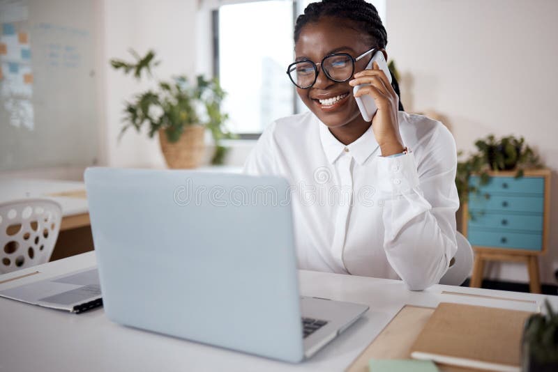 Keeping Clients in the Loop. a Young Businesswoman Using a Laptop and ...