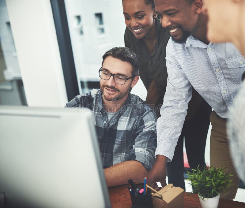 Keeping Everyone on the Same Page. High Angle Shot of a Group of ...