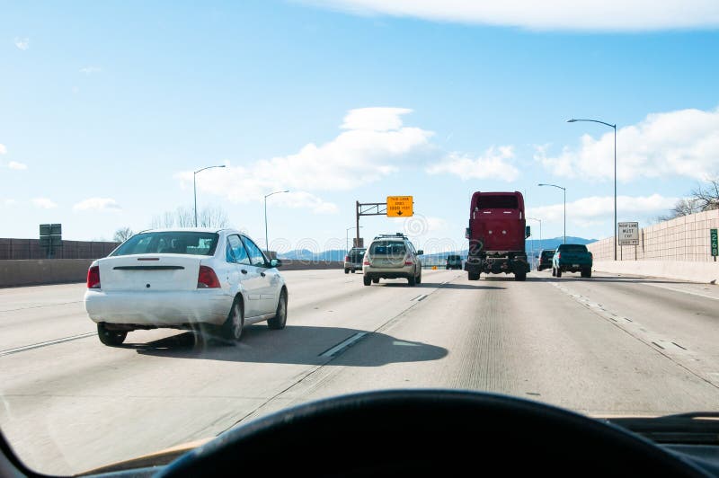 Road Crew Working on a Busy Freeway Stock Photo - Image of barrier ...