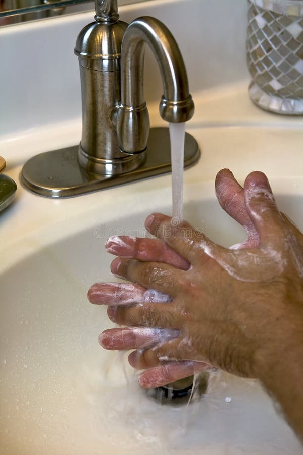 Keeping hands clean stock photo. Image of bacterial, spicket - 5841034