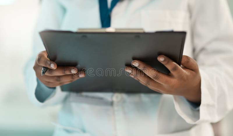 Keeping a Log of the Latest Data. Closeup Shot of an Unrecognisable ...