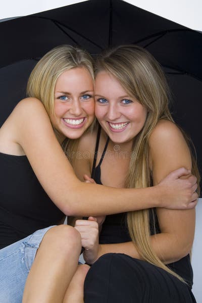 Keeping Out of the Rain stock photo. Image of female, blue - 1384068