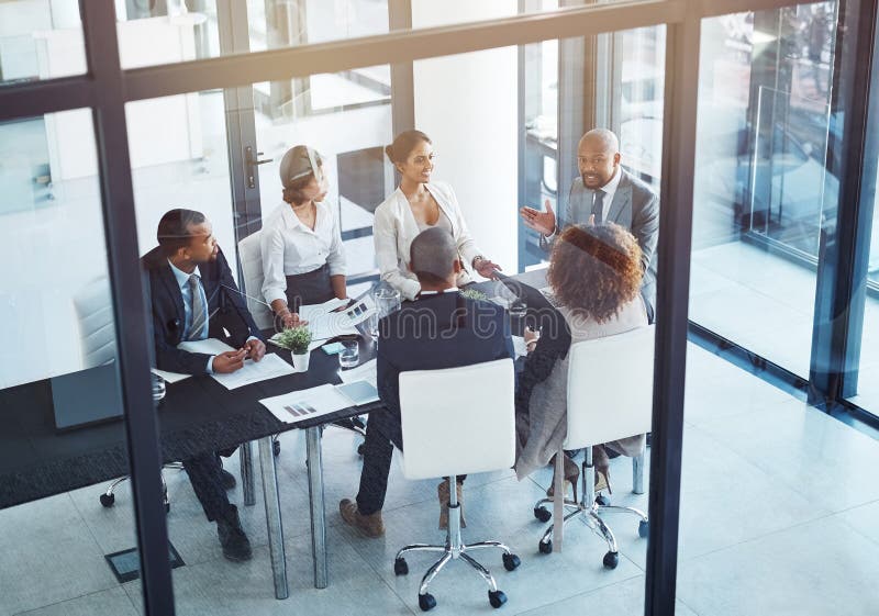 Keeping Their Meeting Right on Track. a Team of Professionals Having a ... Keeping Their Meeting Right on Track. a Team of Professionals Having a ...