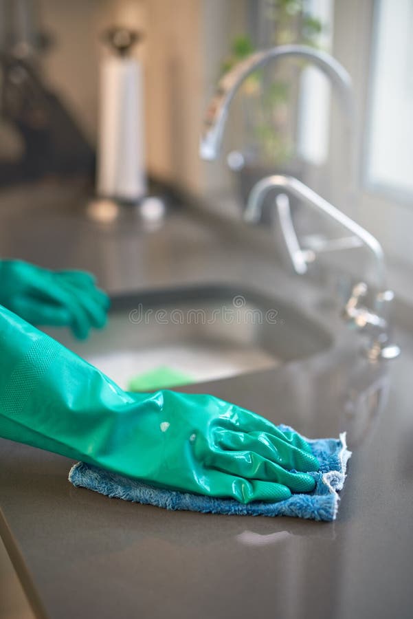 Keeping Things Spotless. Closeup of a Person Cleaning a Kitchen Surface ...