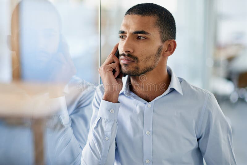 Keeping in Touch with Valued Clients. a Handsome Young Businessman ...