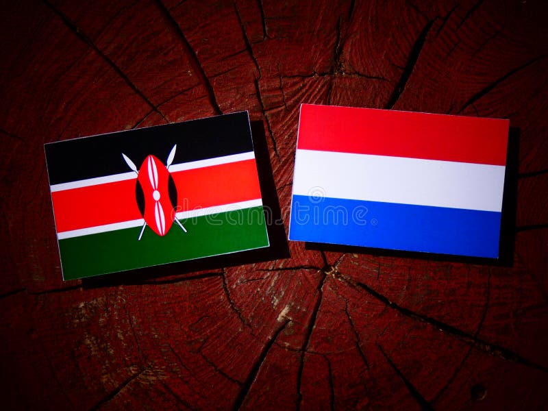 Kenyan Flag with Dutch Flag on a Tree Stump Isolated Stock Photo ...