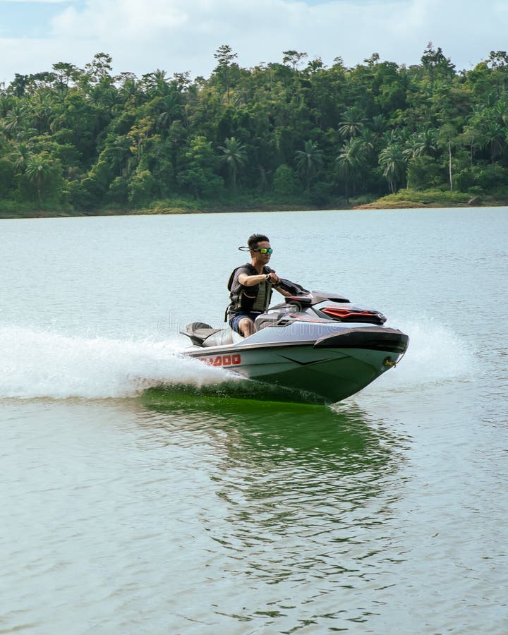 Kenyir, Malaysia - July 24, 2020: Man Riding Jet Ski Editorial Stock ...