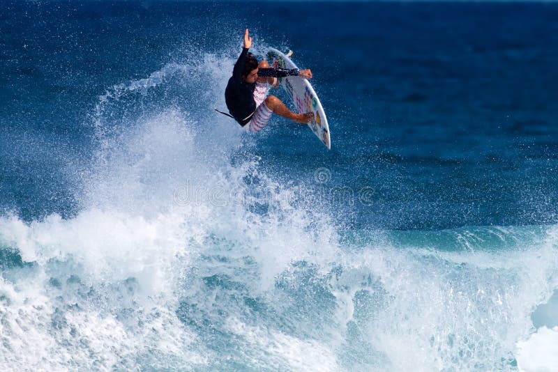 Keoni Jones Surfing at Rocky Point in Hawaii Editorial Photo - Image of ...
