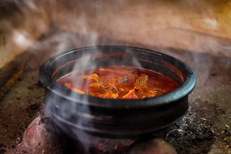 Kerala Fish Curry. Clay Pot Cooking in Kerala. Stock Image - Image of ...