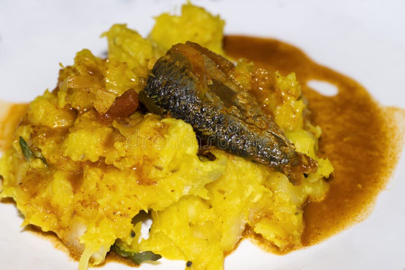Kerala Style Yellow Tapioca with Fish Curry in White Background ...