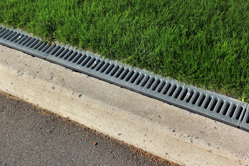 Kerbside and Rainwater Drainage System in a Park Stock Image - Image of ...