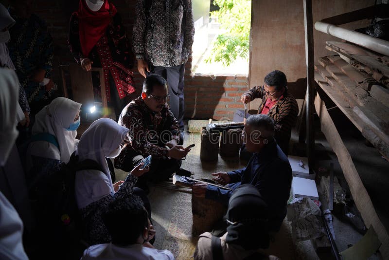 Keris Craftsmen are Teaching Visitors about the Process of Making Keris ...