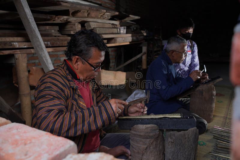 Keris Craftsmen are Teaching Visitors about the Process of Making Keris ...