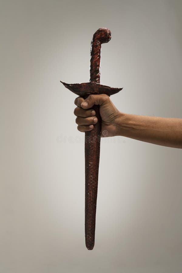 A Keris in Hand with Grey Background Stock Photo - Image of ancient ...