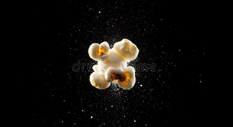 A Kernel of Popped Popcorn is Suspended Against a Black Background ...