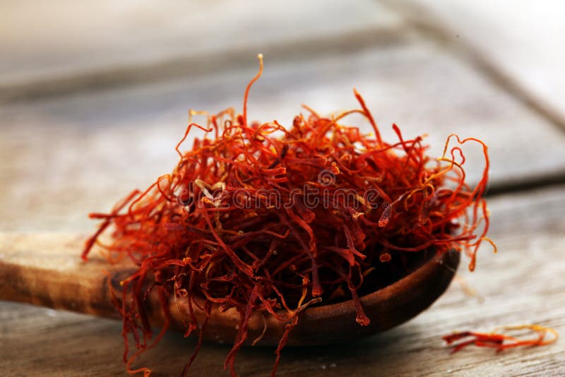 Kesar, Saffron, Crocus Sativus on Rustic Table, Pile of Indian Saffron ...