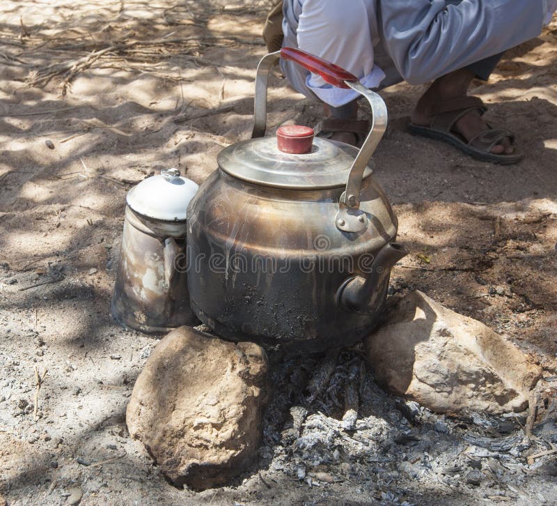 Campfire with Cooking Pots in Hot Desert Climate Stock Photo - Image of ...