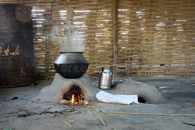 Cooking on a Mud Oven stock image. Image of asian, fire - 167942591