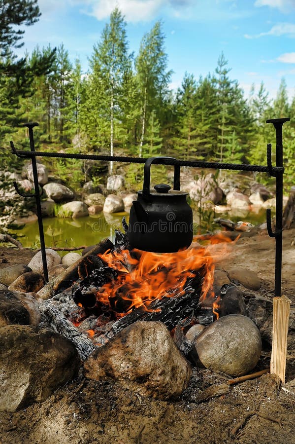 Kettle on the fire stock photo. Image of black, bonfire - 43727490