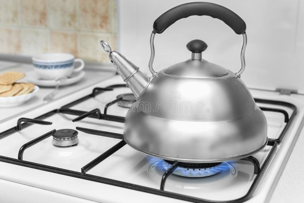 Kettle on a gas stove stock image. Image of food, indoors - 49228459