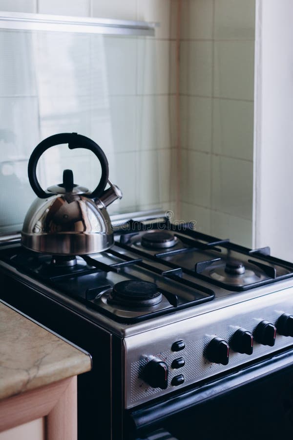 The Kettle is on the Gas Stove in the Kitchen Stock Photo - Image of ...